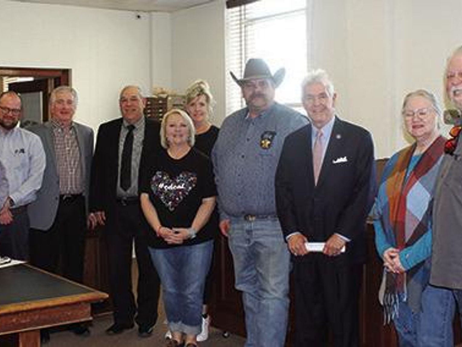 Congressman Williams speaks with County Officials