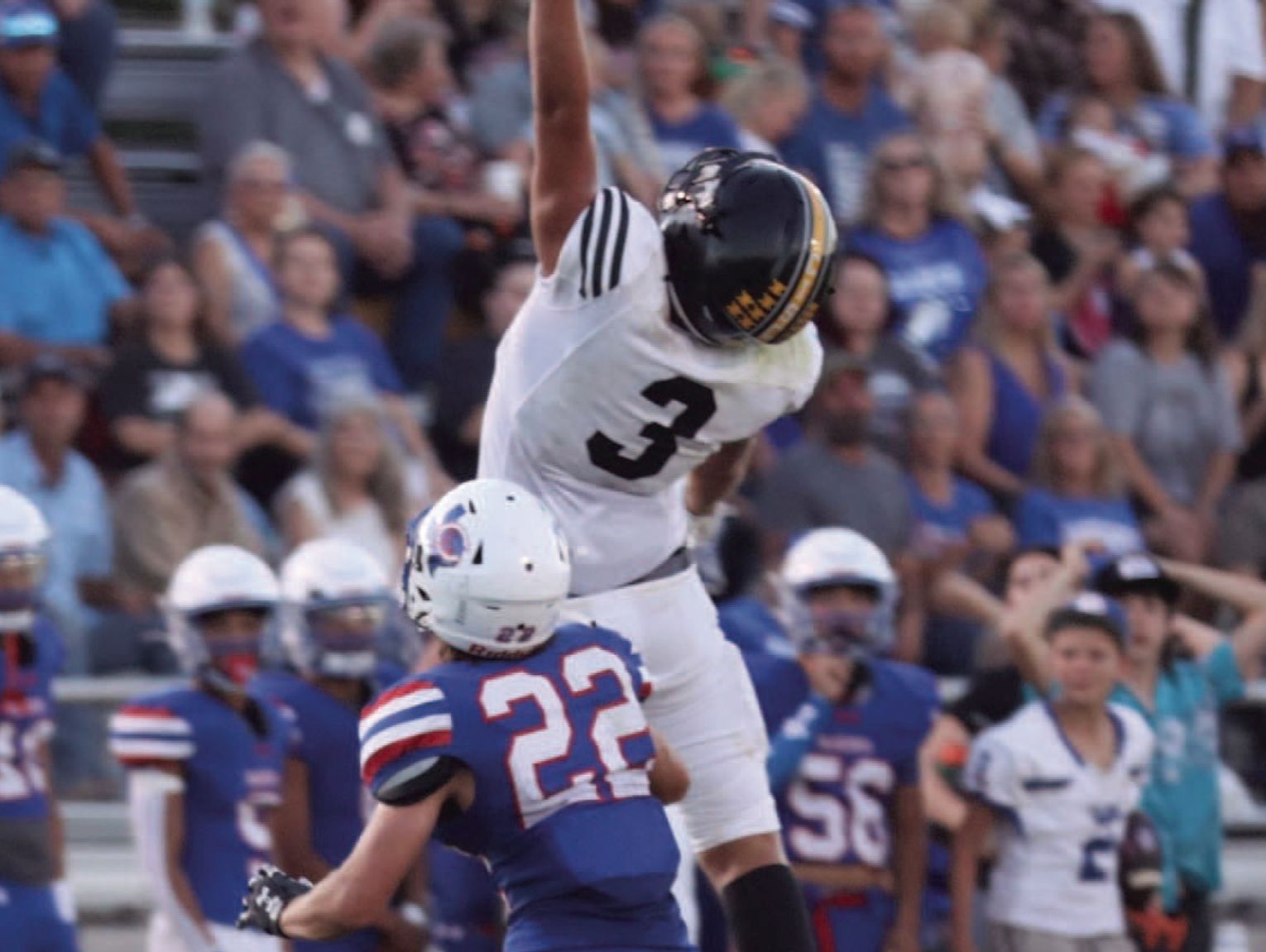 Lobo #3 Laike Kennedy reaching for the football last Friday in Coleman ...